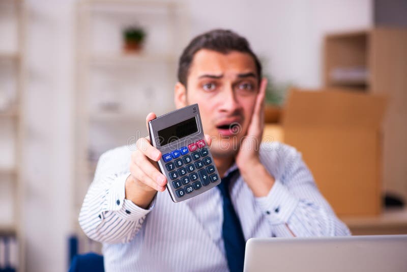 Young Male Accountant in Crisis Concept Stock Photo - Image of ...