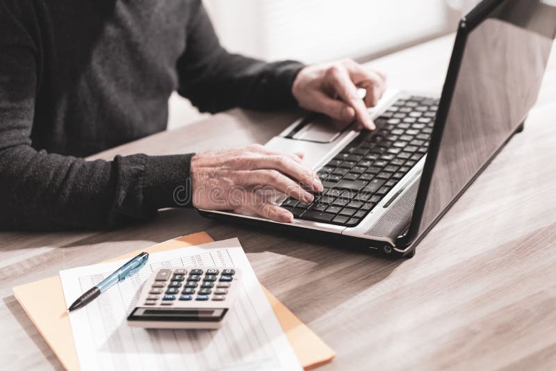 Accountant Working on Laptop Stock Photo - Image of statistics, finance ...