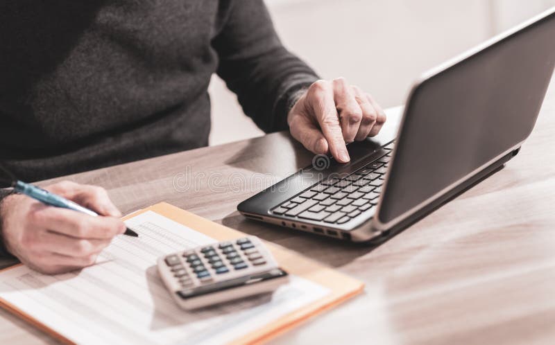 Accountant Working on Laptop Stock Photo - Image of financial ...
