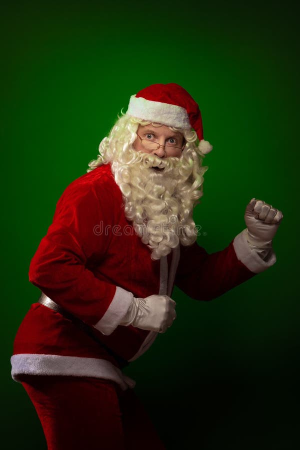 Male Actor in a Costume of Santa Claus Dancing and Gesturing Stock ...