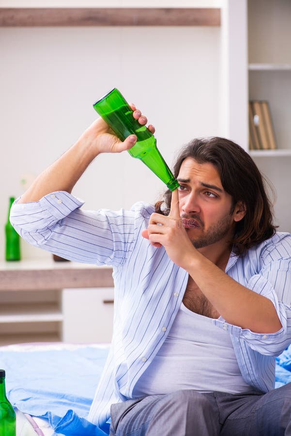 Young Male Alcoholic in the Bedroom Stock Image - Image of bankrupt ...