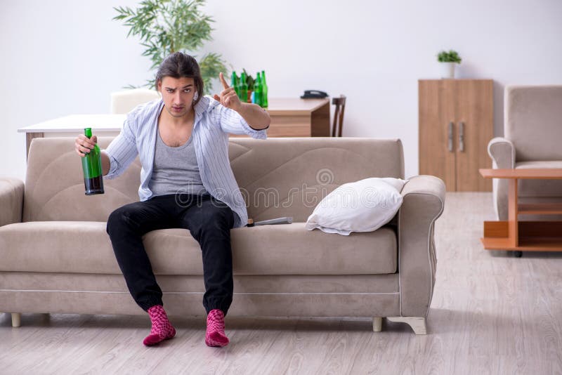 Young Male Alcoholic Drinking Wine at Home Stock Image - Image of ...