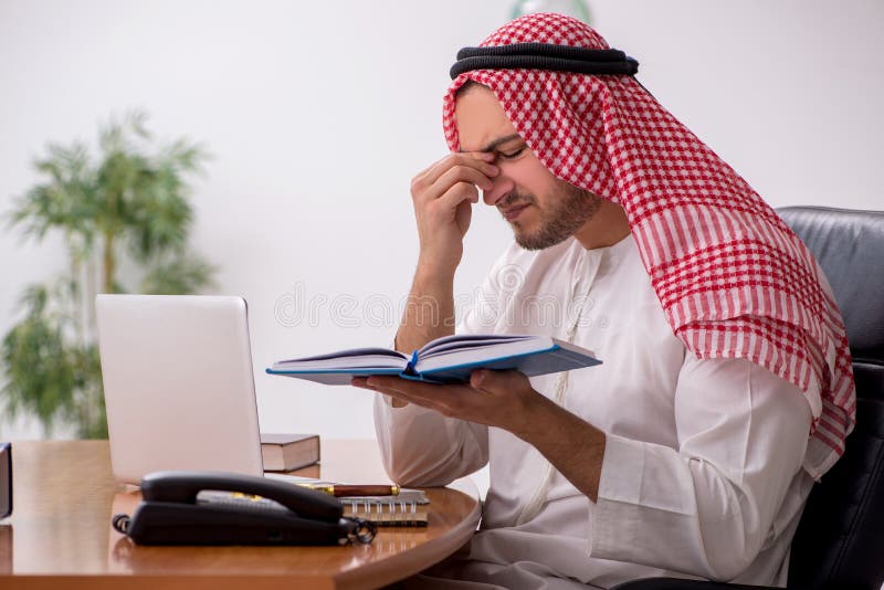 Young Male Arab Employee Working in the Office Stock Photo - Image of ...