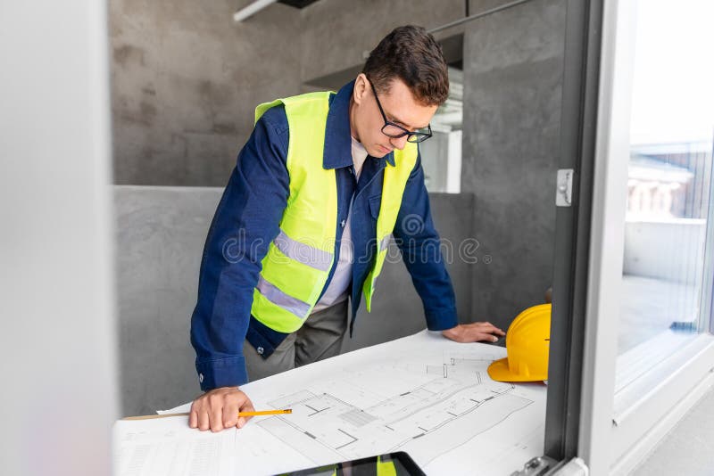 Male Architect with Blueprint Working at Office Stock Image - Image of ...