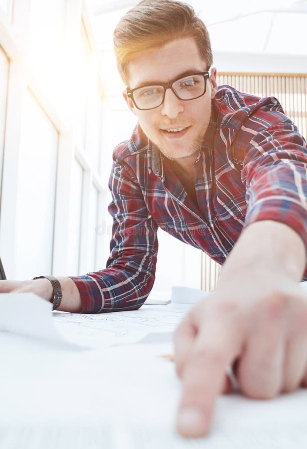 Male Architect with Digital Tablet Studying Plans in Office Stock Image ... Male Architect with Digital Tablet Studying Plans in Office Stock Image ...