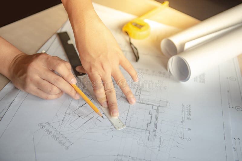 Male Architect Hand Sketching on Architectural Drawing Stock Image ...