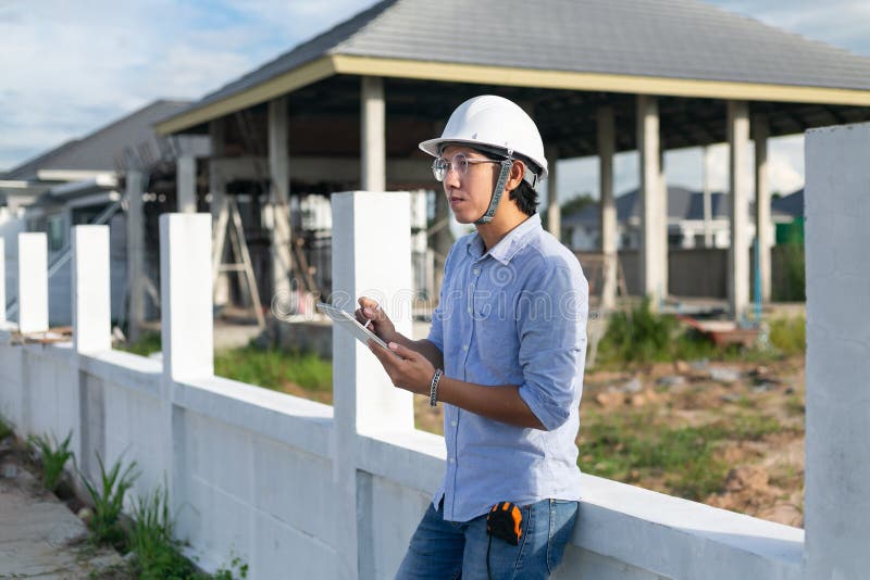 Male Architect, Inspecting House Construction Stock Photo - Image of ...