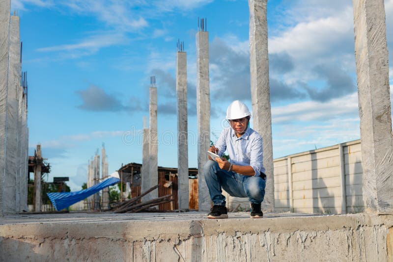 Male Architect, Inspecting House Construction Stock Photo - Image of ...