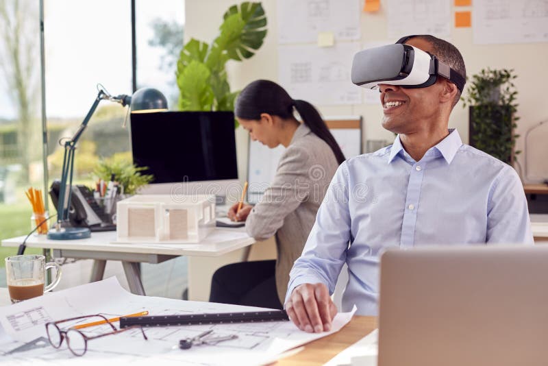 Male Architect in Office Using VR Headset To Design New Building Stock Image - Image of design ...