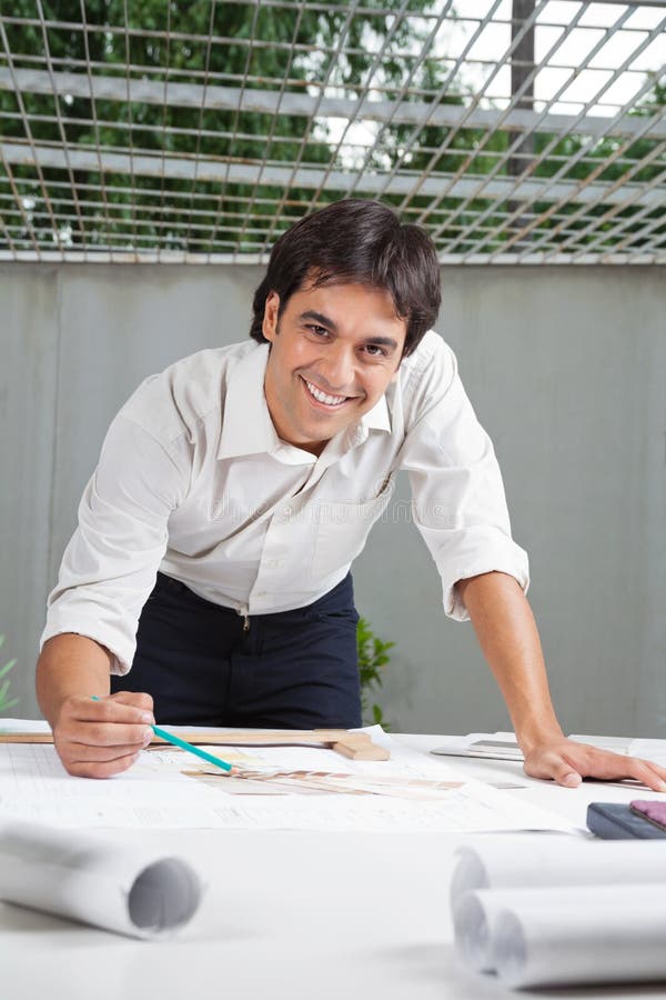 Male Architect Working on Blueprint Stock Image - Image of architect ...