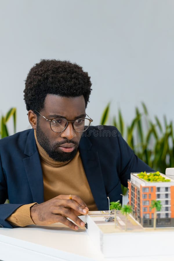 Male Architect Working on the Project and Looking Involved and Excited ...