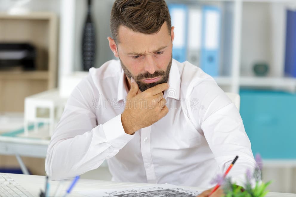 Male Architect Writing Notes in Office Stock Photo - Image of ...