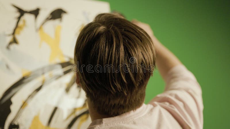 Male Artist Back of Head Paints Art Green Screen Stock Footage - Video ...