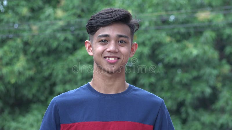 A Smiling Asian Teen Filipino Male Stock Footage Video Of Joyful