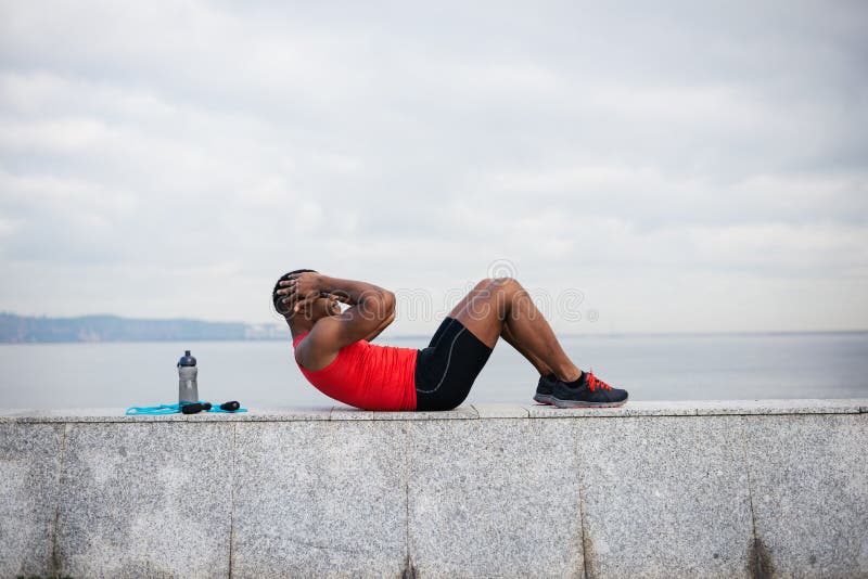 Male Athlete Doing Crunches Stock Photo - Image of sport, black: 77347704