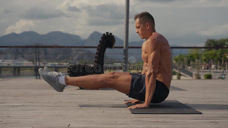 Male Athlete Doing L Sit Exercise on the Floor. L Sit Yoga Pose. Core ...
