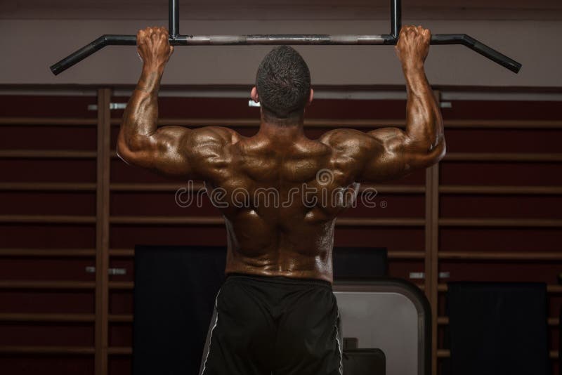 Male Athlete Doing Pull Ups Stock Image - Image of back, physique: 68351273