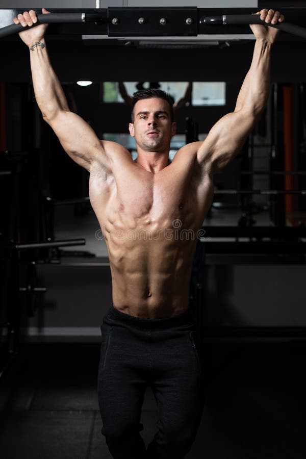 Male Athlete Doing Pull Ups Stock Image - Image of bodybuilding, adult ...