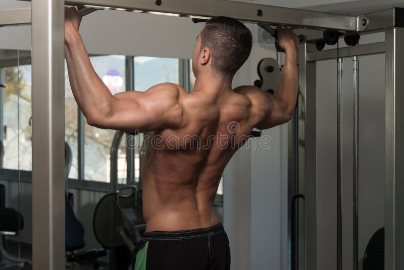 Male Athlete Doing Pull Ups Stock Image - Image of attractive ...