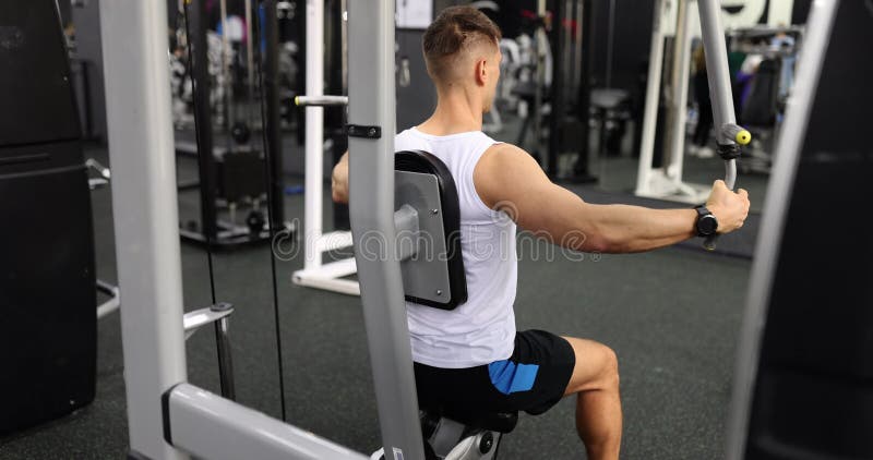 Male Athlete Pulls Machine in Gym Stock Video - Video of exercise ...