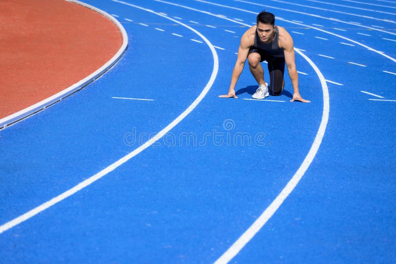 Male Athlete on Race Track is Ready To Run Stock Photo - Image of ...