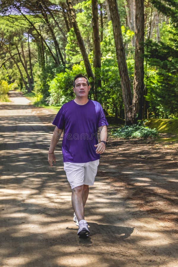 Male Athlete Walking after Running Outdoors Stock Photo - Image of ...