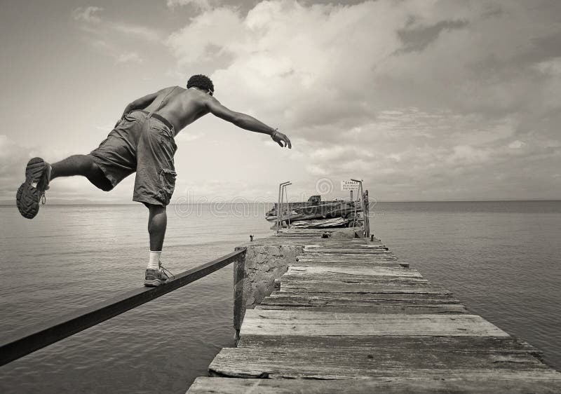 Male Balancing on One Foot stock image. Image of back - 2278623