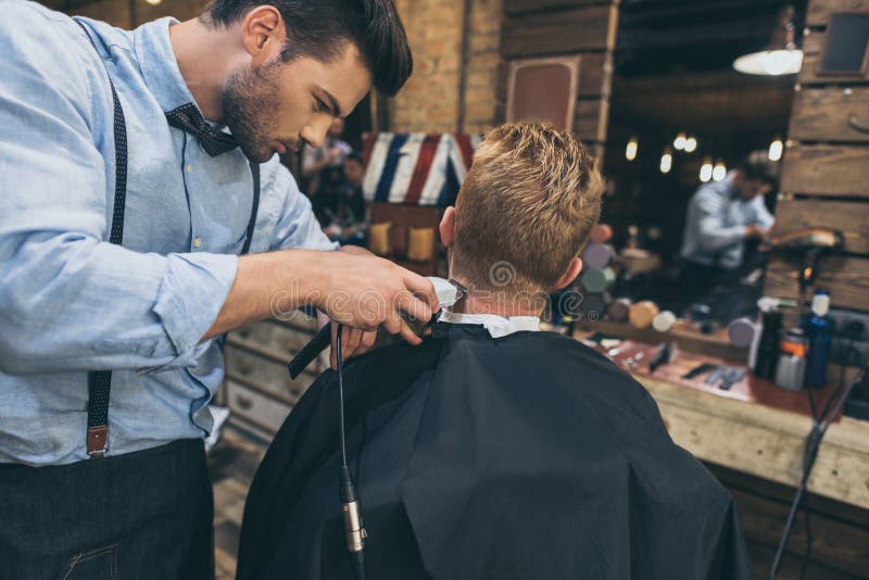 Male Barber Cutting Hair of Customer in Barber Stock Photo - Image of ... Male Barber Cutting Hair of Customer in Barber Stock Photo - Image of ...