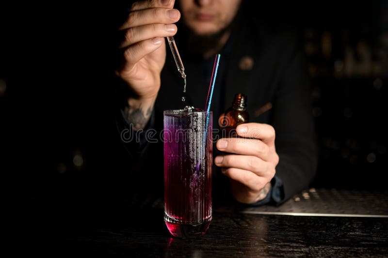 Male Bartender Pours Alcohol Cocktail with Dropper Stock Image - Image ...