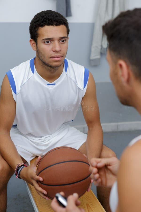 Male Basketball Player Practicing with Male Coach Stock Photo - Image ...