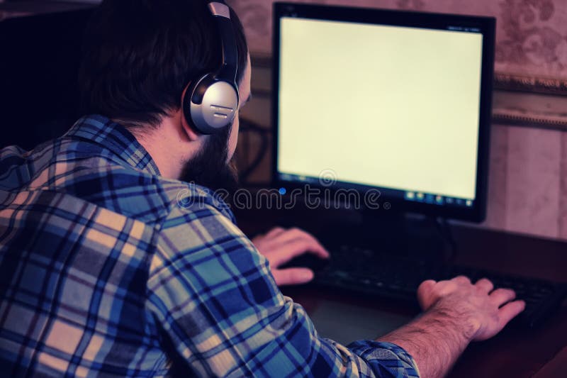 Male Behind Computer with Headphones Stock Photo - Image of modern ...