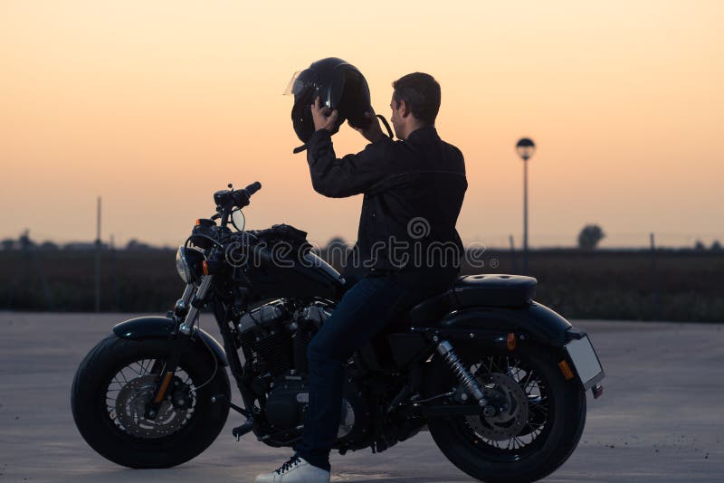 Male Biker on His Motorcycle Stock Photo - Image of machine, stylish ...