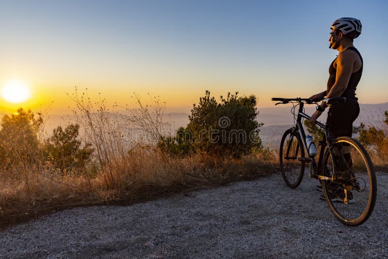 Male Biker Cycling on a Mountain Road Stock Photo - Image of people ...