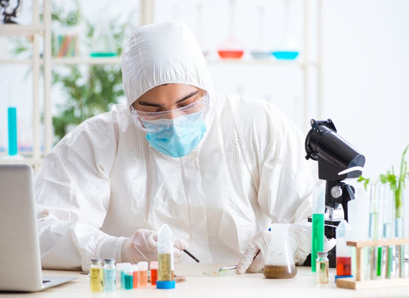 Male Biochemist Working in the Lab on Plants Stock Image - Image of ...