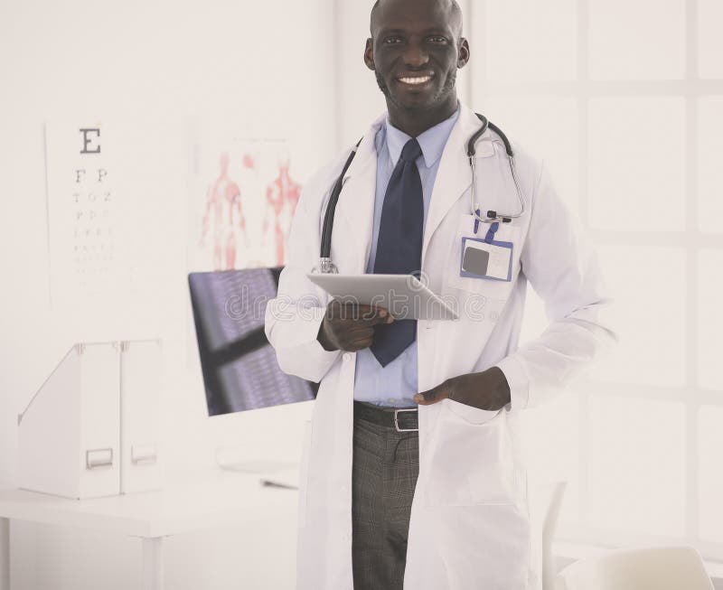 Male Black Doctor Worker with Tablet Computer Standing in Hospital ...