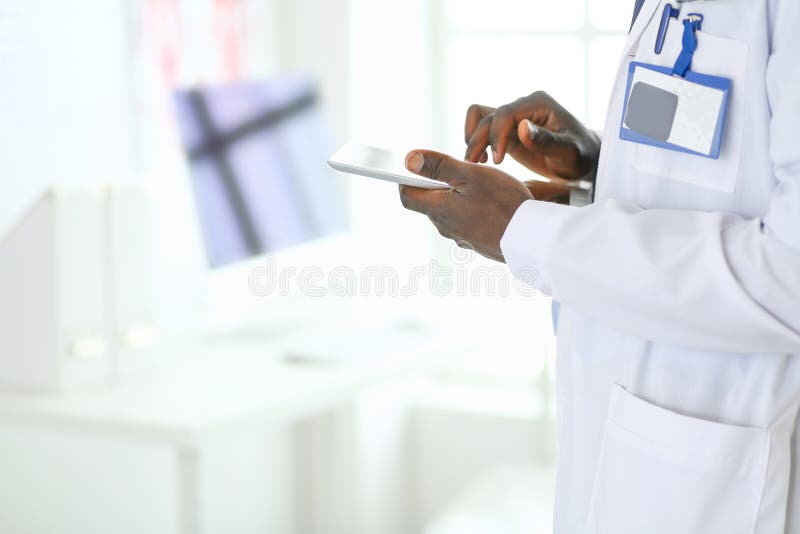Male Black Doctor Worker with Tablet Computer Standing in Hospital ...