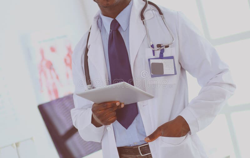 Male Black Doctor Worker with Tablet Computer Standing in Hospital ...