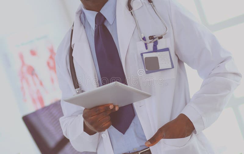 Male Black Doctor Worker with Tablet Computer Standing in Hospital ...