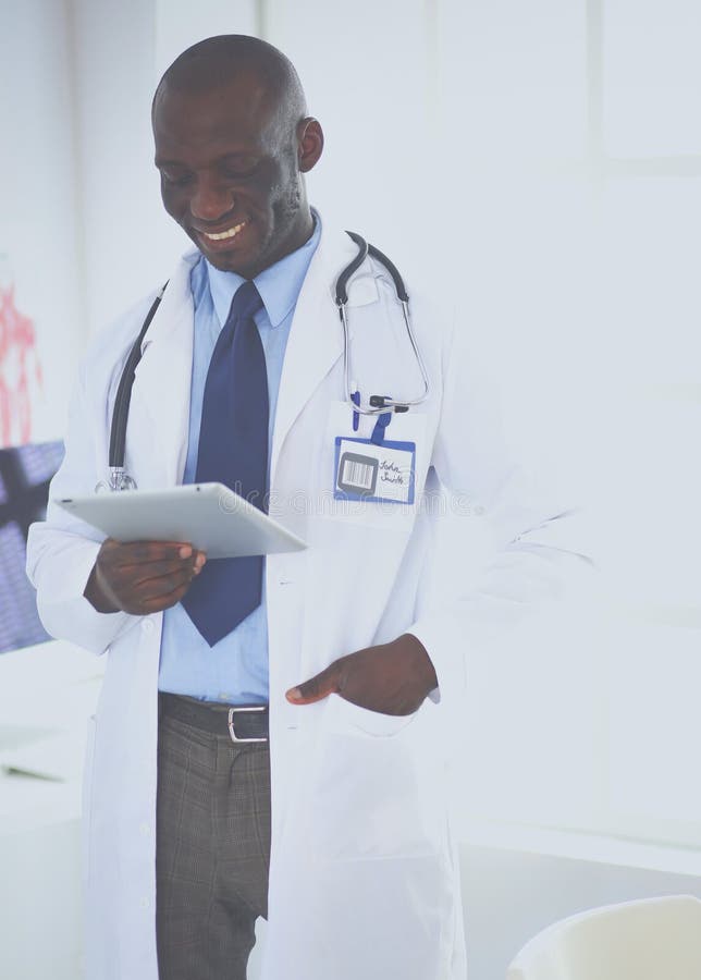 Male Black Doctor Worker with Tablet Computer Standing in Hospital ...