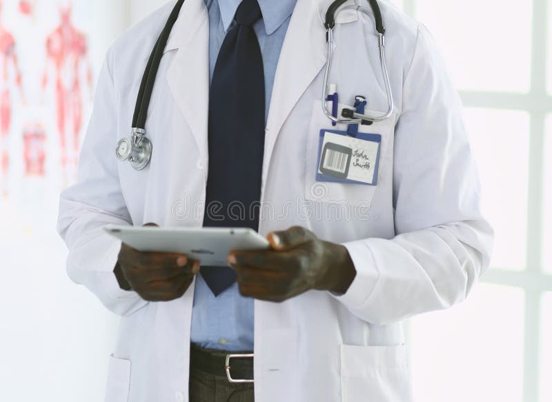 Male Black Doctor Worker with Tablet Computer Standing in Hospital ...