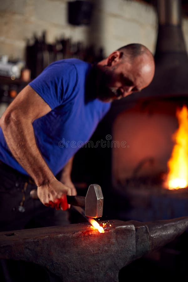 Blacksmith Hammering Hot Metal Stock Image - Image of forge, anvil ...