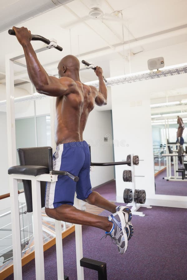Male Body Builder Doing Pull Ups at the Gym Stock Photo - Image of ...