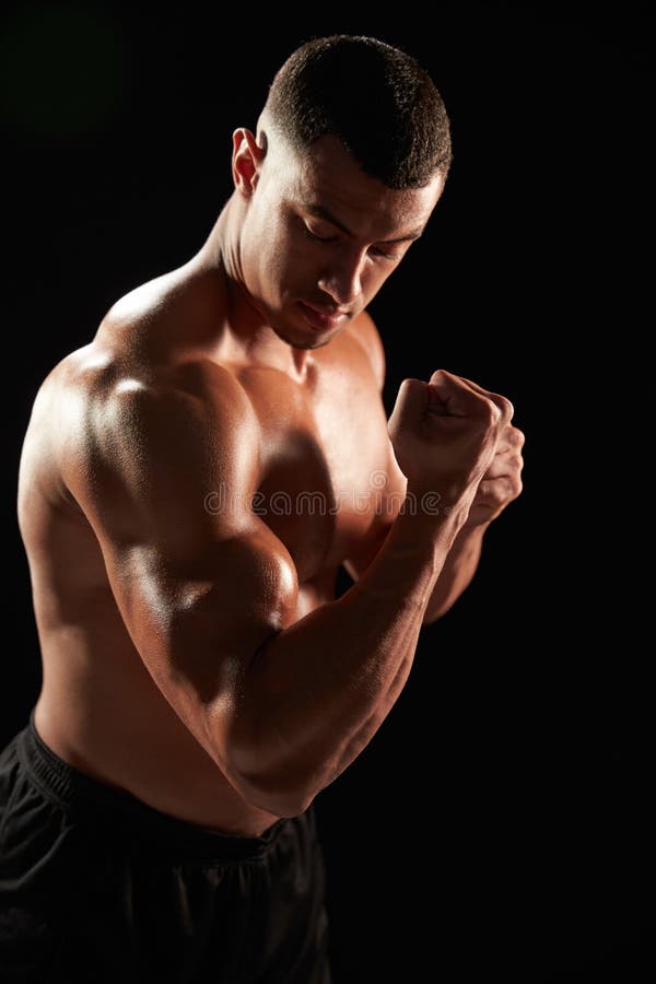 Male Bodybuilder Flexing Muscles Stock Image - Image of biceps ...