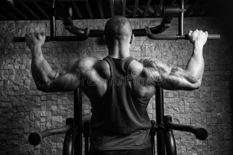 Male Bodybuilding Athlete Doing Pull Ups Stock Photo - Image of ...