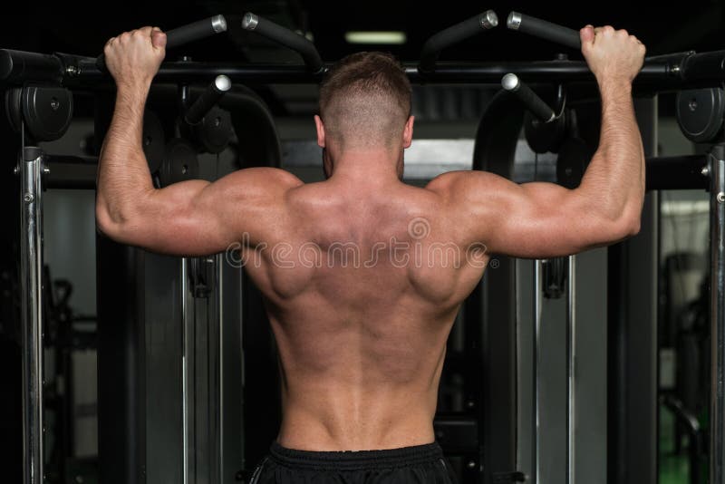 Male Bodybuilding Athlete Doing Pull Ups Stock Photo - Image of ...