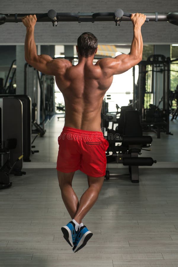 Male Bodybuilding Athlete Doing Pull Ups Stock Photo - Image of body ...