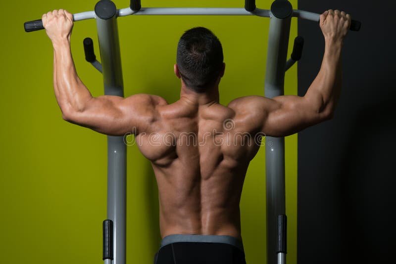 Male Bodybuilding Athlete Doing Pull Ups Stock Photo - Image of ...