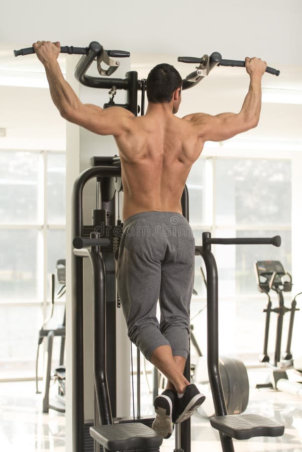 Male Bodybuilding Athlete Doing Pull Ups Stock Photo - Image of ...