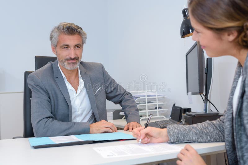 Male Boss and Female Secretary in Office Stock Photo - Image of ...