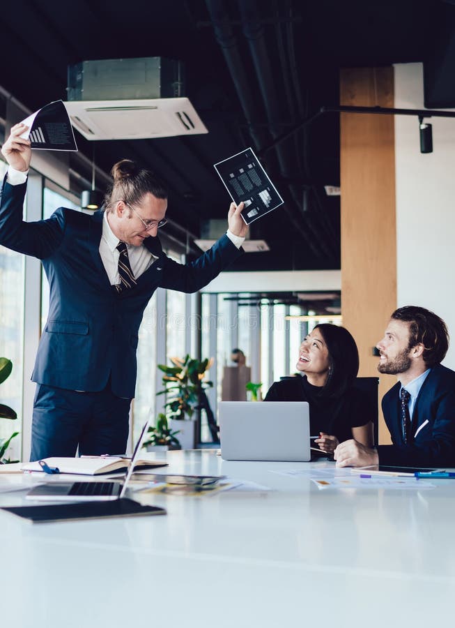 Male Boss Solving Problems with Report Statistics during Briefing ...